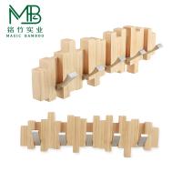 China Bamboo wall mounted rack with metal hook for living room for sale