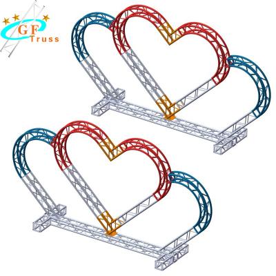 China Love Shape Arch Truss Aluminum Truss System For Wedding Stand Drop Back for sale