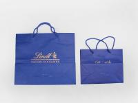 China C1S C2S Glossy Coated Personalized Paper Bags Sea Blue Garment Shopping Paper Bags for sale