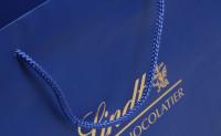 China C1S C2S Glossy Coated Personalized Paper Bags Sea Blue Garment Shopping Paper Bags for sale