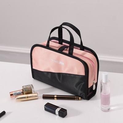 China Black Pink Waterproof Cosmetic Bag Foldable Clear Plastic Toiletry Bag Makeup for sale