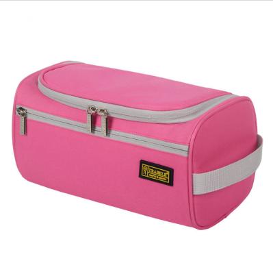 China Waterproof Hanging Toiletry Bag 25x15x14cm Round Barrel Shape Travel Makeup Organizer for sale