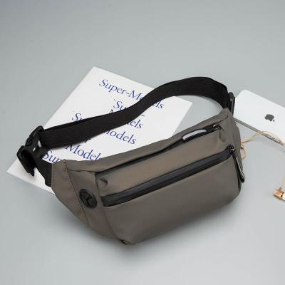 China Waterproof Nylon Waist Bag 26cm Unisex Travel Fanny Pack with Multiple Pockets for sale