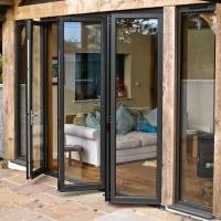 China Eco Friendly Aluminum Folding Door with Reinforced Frame and Weather Resistant Design for sale