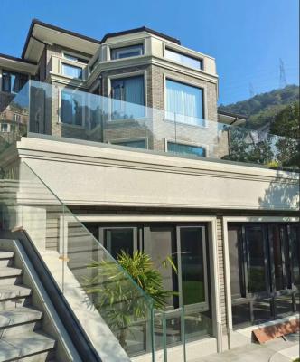 China Modern U Channel Glass Railing with 10 Years Warranty and 36'' 42'' 48'' Height Floor Mounted Frameless Glass Balustrade for sale