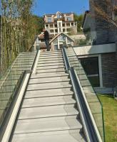 China Modern U Channel Glass Railing with 10 Years Warranty and 36'' 42'' 48'' Height Floor Mounted Frameless Glass Balustrade for sale