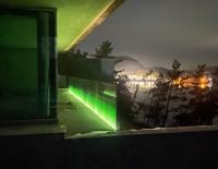 China 12mm Environmental Protection Frameless Glass Balcony Railing with LED Light and Stable Structure for sale