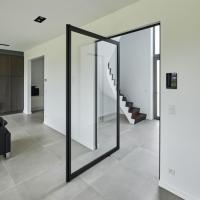 China Modern Aluminum Pivot Door with Low-E Glass, Wind Resistance Level 7, and Sound Insulation for Villas for sale