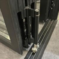 China Modern Aluminum Folding Door with 6m Max Height 1m Max Panel Width and 2.0mm Profile Thickness for sale