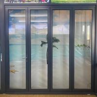 China Sleek And Modern Aluminum Folding Door with Secure Locking Mechanism and Good Sound Insulation for sale