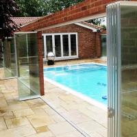 China Durable Aluminum Folding Door with 50 Years Life Span Wind and Rain Resistance and Heat Insulation for sale