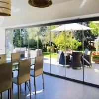 China Durable Aluminum Folding Door with 50 Years Life Span Wind and Rain Resistance and Heat Insulation for sale