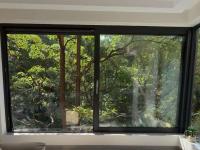 China Customized Black Frame Aluminum Sliding Sash Windows with Stainless Steel Hardware and 50-Year Lifespan for sale