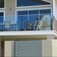 China Customized Black Coating Frameless U Channel Glass Railing with 12mm Toughened Glass Balustrade for sale