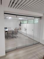 China Fluorocarbon Spraying Aluminum Folding Door with Tempered Glass and Customized Size for sale