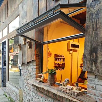 China Aluminum Alloy Custom Bi-folding Vertical Fold Windows for Coffee Shop Restaurant Exterior Villa-Thermal Insulation Windproof for sale
