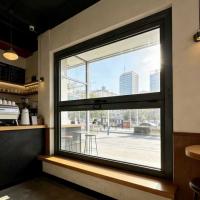 China Aluminum Alloy Vertical Fold Window Thermal Insulation Double Glass Windproof Soundproof Bifold Window for Hotel Outdoor Use for sale