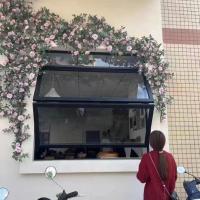 China Aluminum Alloy Vertical Fold Window Thermal Insulation Double Glass Windproof Soundproof Bifold Window for Hotel Outdoor Use for sale