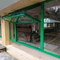 China Modern Colorful Aluminum Alloy Vertical Opening Window Windproof Bifold Folding Customizable Thermal Outdoor Hotel Villa for sale