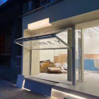 China Aluminum Vertical Opening Folding Windows Double Glazing Waterproof Modern Kitchen Windows for Villas Hotels Houses Balcony for sale