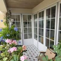 China Customized Modern French Style Tempered Glass Aluminum Folding Door Waterproof Exterior Entry Bifold Door for Courtyard Villa for sale