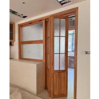 China Frameless Aluminum Tempered Glass Indoor/Outdoor Exterior Foldable Door Minimalist Restaurant Partition Customized Bi-fold for sale