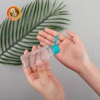China OEM Mini Plastic Sanitizer Bottle PCR PLA Travel Size Hand Sanitizer Bottle With Silicone Holder for sale