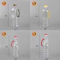 China Food Grade Sunflower Oil 1 Litre Bottle Clear Plastic Vinegar Bottle With Handle for sale