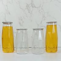 China Snacks 0.5 Liter Juice Storage Container With Snap Lids PET Storage Jars for sale