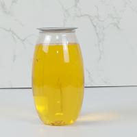 China Olive Shape Juice Plastic Storage Bottles 500ml Clear PET Container Jars for sale