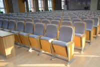 China Walnut Movie Theater Seats Foam Density 60kg/m3 Church Theater Chair 580mm Center Distance for sale