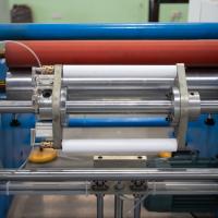 China High Speed Semi Automatic Cling Film Aluminum Foil Roll Rewinding Machine With 2 Shafts for sale