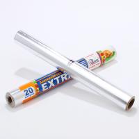 China Kitchen Customized Width Aluminum Foil Roll with Plastic Film and Lubricated Surface for sale