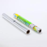 China Kitchen Customized Width Aluminum Foil Roll with Plastic Film and Lubricated Surface for sale