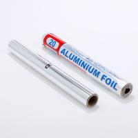 China Kitchen Customized Width Aluminum Foil Roll with Plastic Film and Lubricated Surface for sale