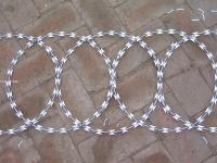 China Galvanized Steel High Tensile Barbed Wire Bto 22 Spiral Blade 14 Gauge for sale