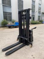 China Support Customized Stand On 1.6 Ton 4 Meters All Electric Stacker Forklift With Side Wheels And Safe Arms for sale