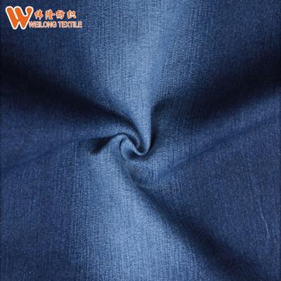 China New style cotton stone washed denim fabrics for women's clothing for sale