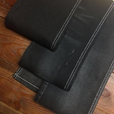 China Tencle Cotton Material Denim Fabric Jeans Black Color 9oz for sale