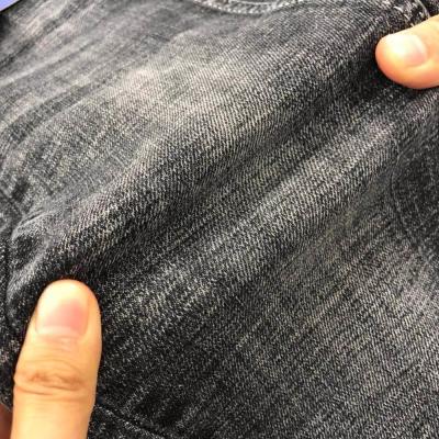 China Stone Washed Super Stretch Cotton Dualfx T400 Lycra Denim Jeans Fabric Sulfur Black for sale