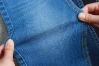 China 11.2 Oz Stretch Denim Fabric With Slub Black Back Side Jeans for sale