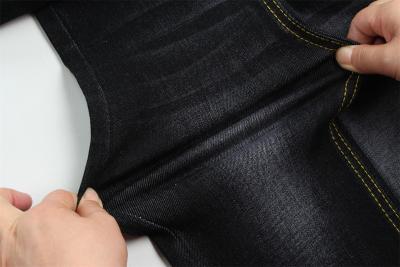 China 11 Oz Warp Slub Black Denim Fabric For Man Jeans High Stretch India Market Style Hot Sell for sale