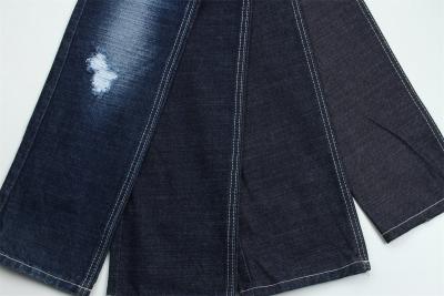 China Rope Dyed Color 100% Cotton Denim Fabric For Classic Men Jeans for sale