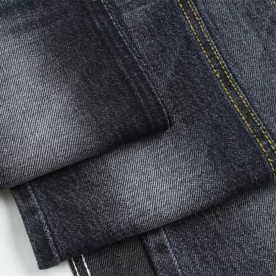 China 10 oz Dark Black Medium Weight 100% Cotton Denim Fabric Sanforizing for Jeans and Workwear for sale