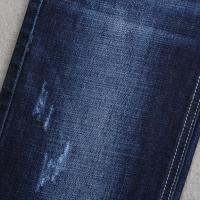 China Soft 9.5oz 100% cotton denim fabric desizing cross hatch slub jeans fabric for men wear for sale