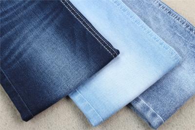 China 8.3 Oz Indigo Blue Jeans Denim Fabric Cotton Poly Spandex Power Stretch for sale