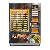 China 24-hour self-service fast food lunch box vending machine with steel door frame and dual microwave heating function for sale