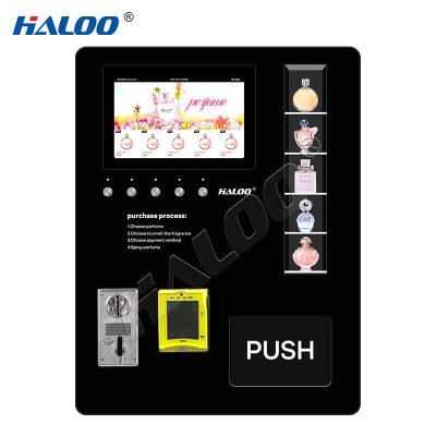 China Haloo wall-mounted perfume spray vending machine can hold four different fragrances and features five sample buttons for tabletop use for sale