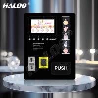 China Haloo wall-mounted perfume spray vending machine can hold four different fragrances and features five sample buttons for tabletop use for sale