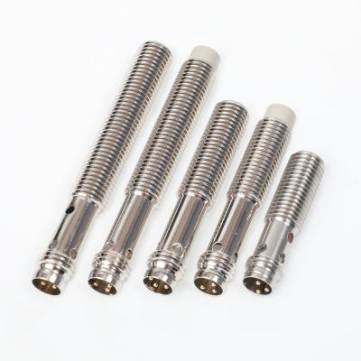 China 8 M12 Connector Inductive Proximity Sensor 1-6mm Sensing Distance IP67 Rated 10-30V DC Nickel-Plated Brass Housing PNP/NPN for sale